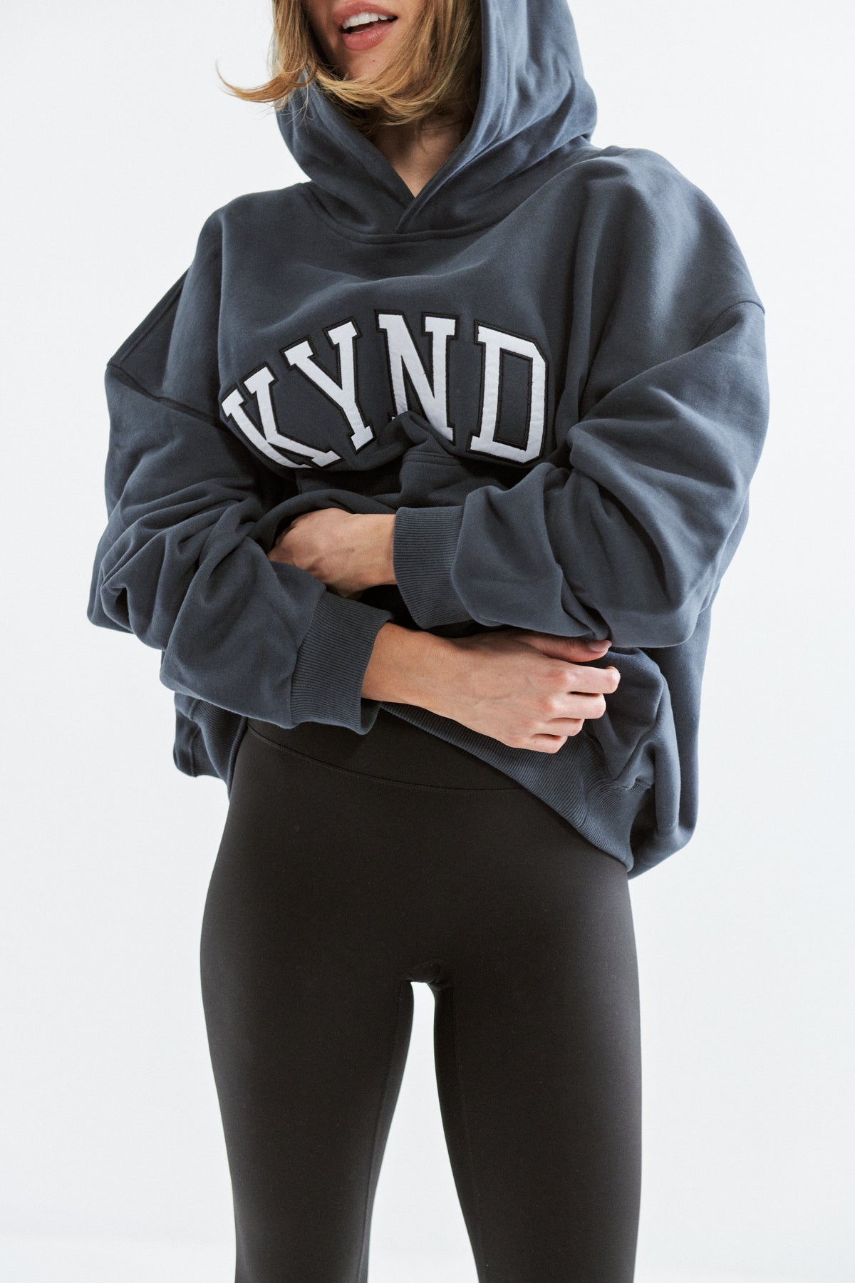 Kynd Society, flattering active essentials to elevate your look.